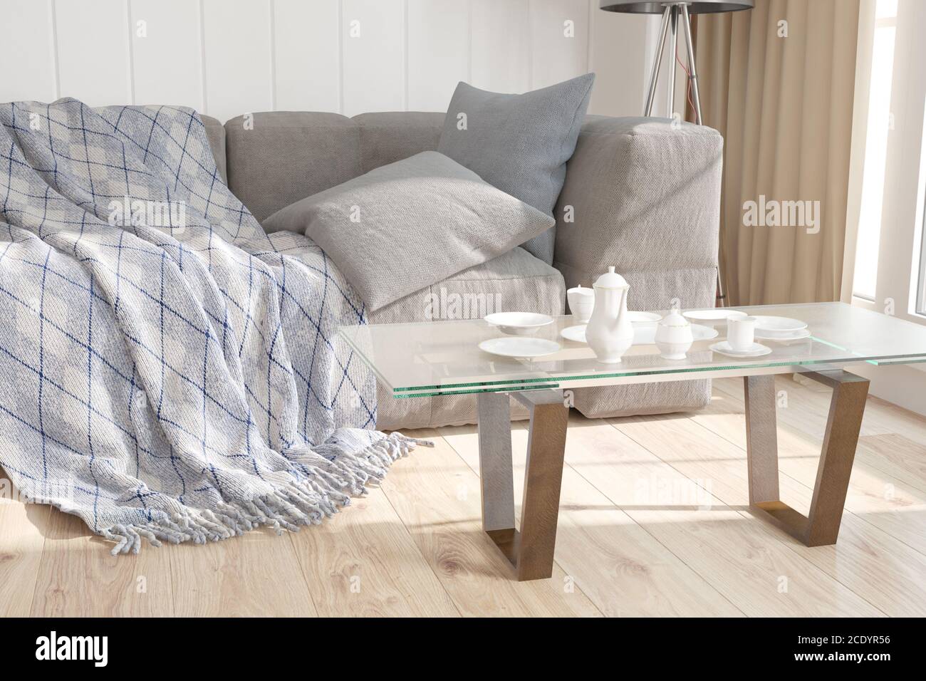 modern mock up of table with tea set and sofa with pillows and plaid ...