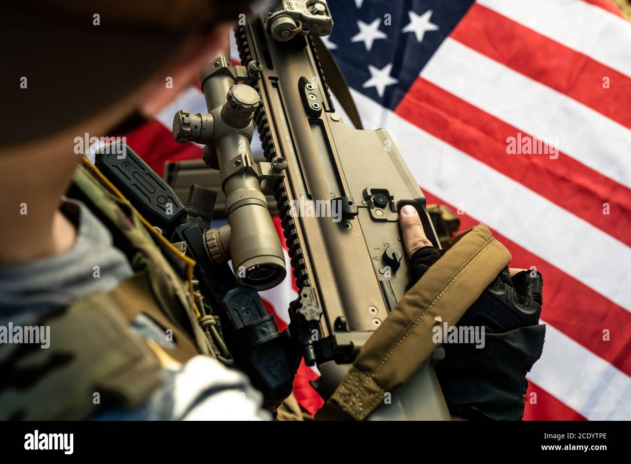 Holding a sniper rifle hi-res stock photography and images - Alamy