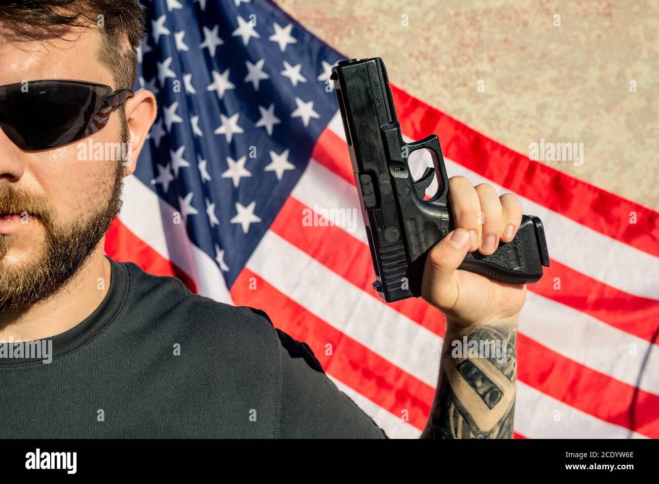 American flag and gun hi-res stock photography and images - Alamy