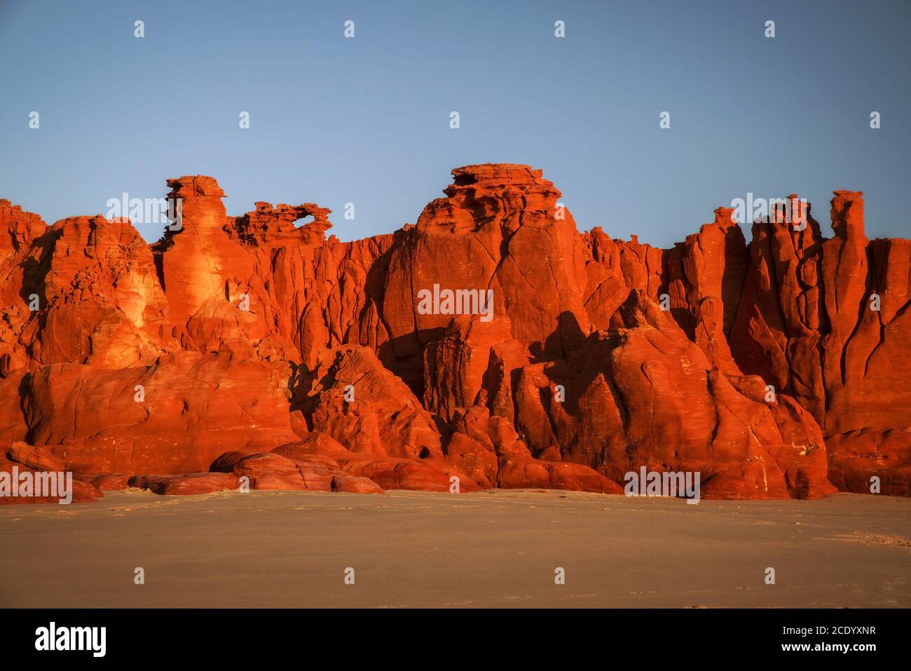 Western Australia rocky coastline with orange colored rocks at Dampier ...