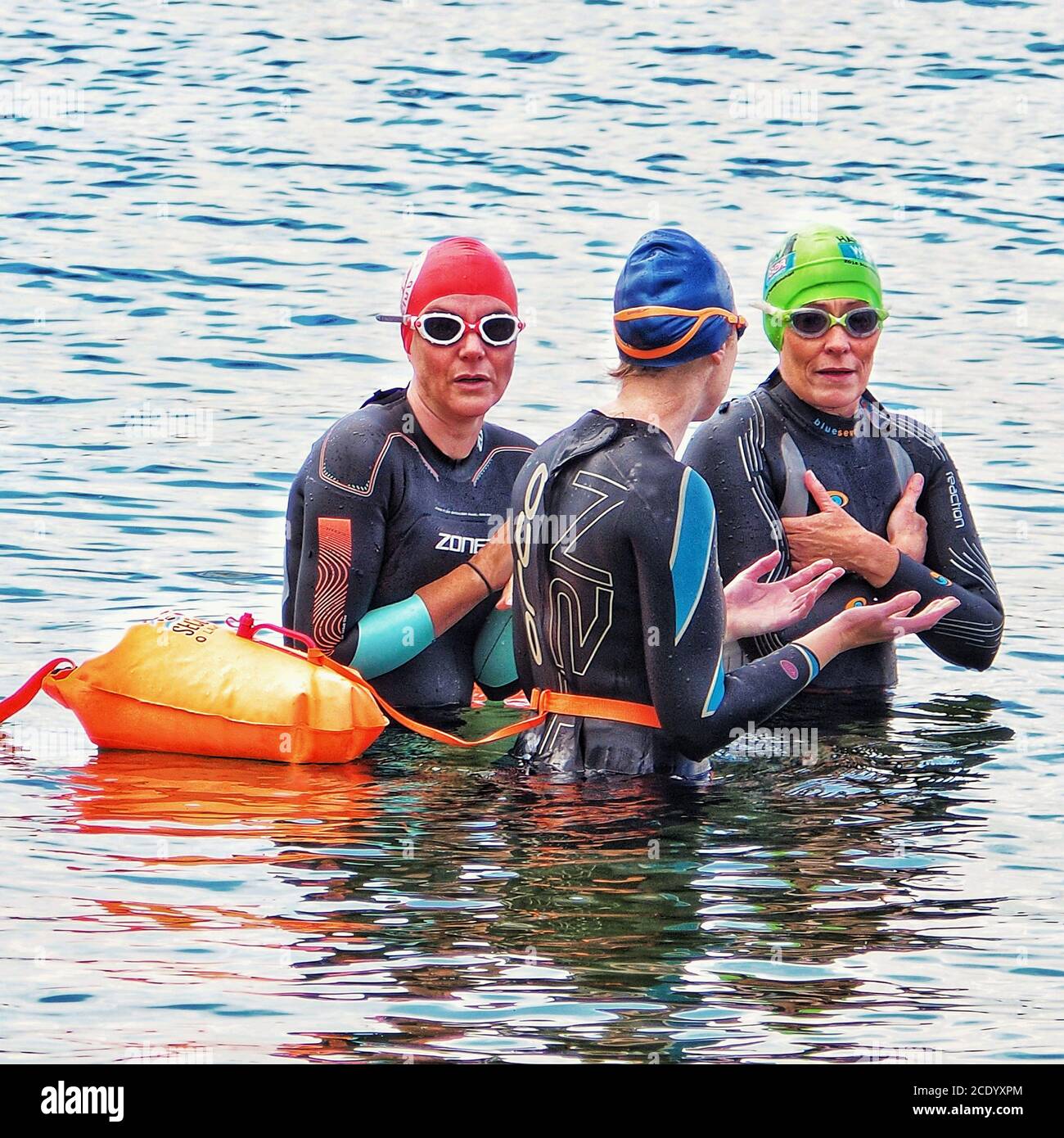 3 Cold water swimmers Stock Photo - Alamy