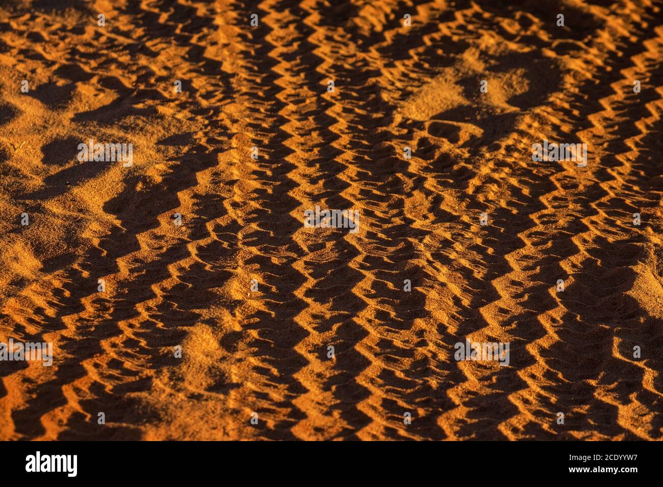 Australia – car tracks at a sandy outback gravel road at a desert after ...