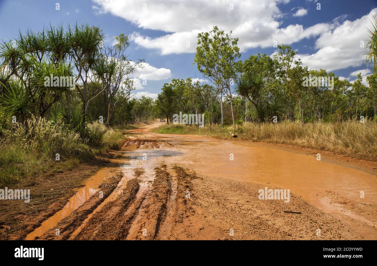 Western Australia – Flooded Outback gravel road after 4WD car crossing ...