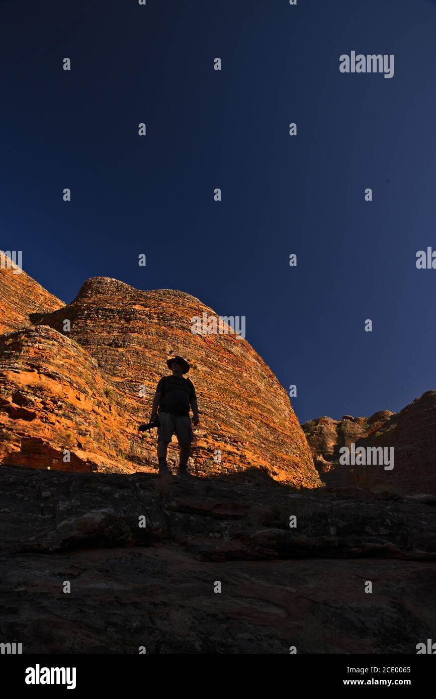 Nature photographer on a hiking trip at the Australian outback between ...