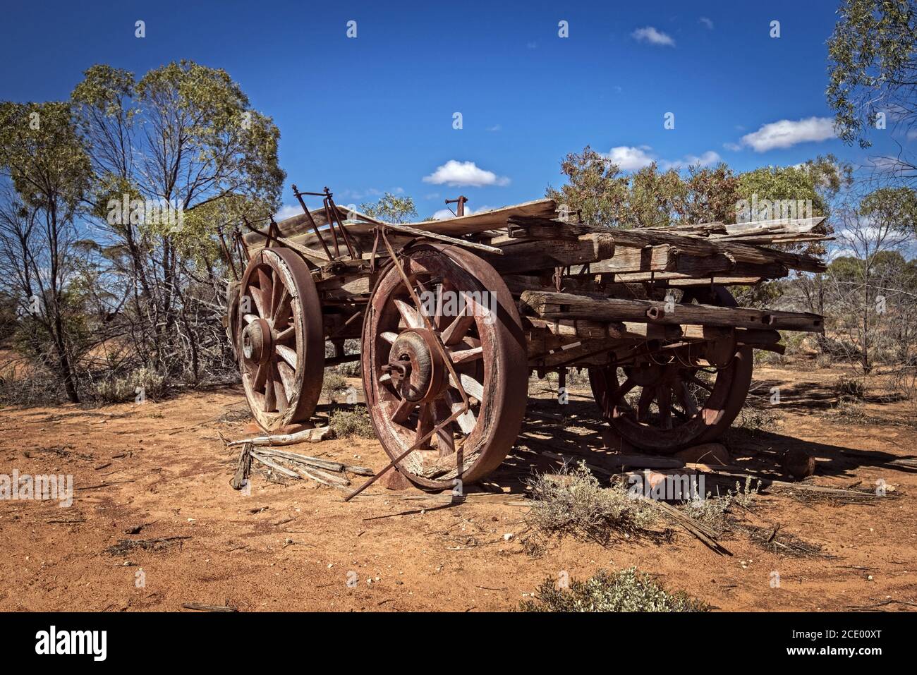 Australia Outback savanna with an old vintage derelict horse-drawn ...