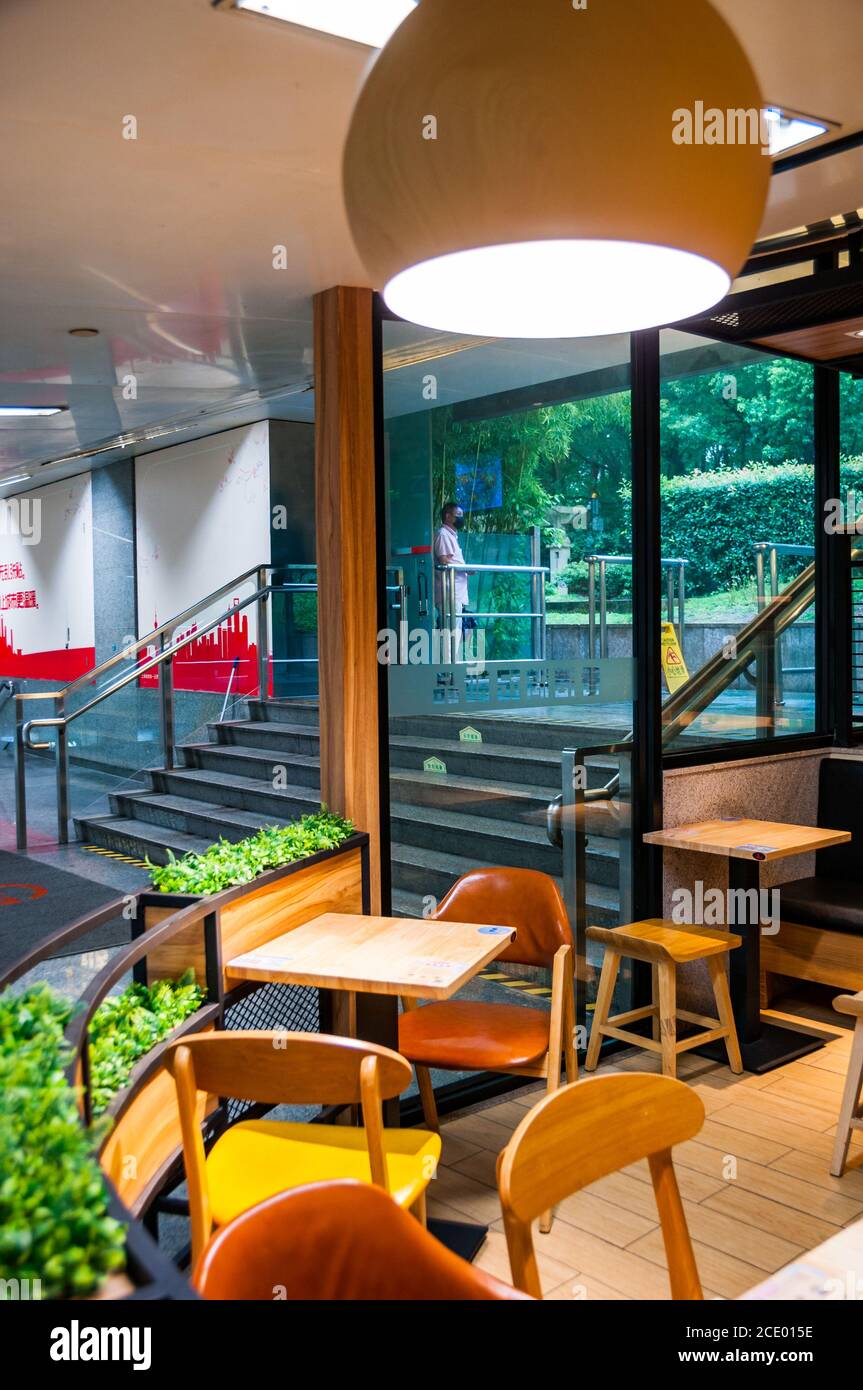 A café at the exit of Shanghai’s People’s Square underground station ...