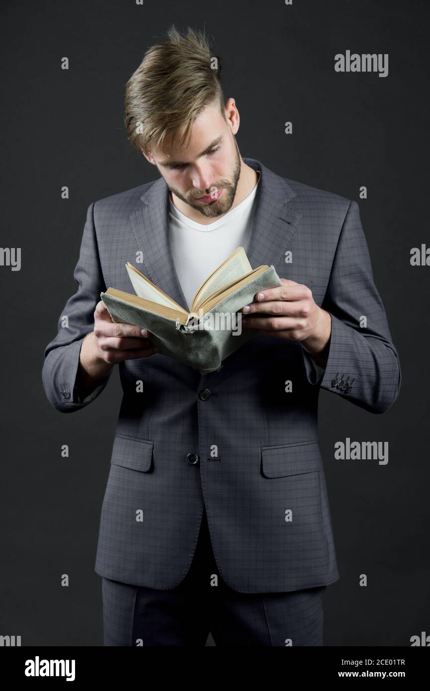 Lawyer bearded concentrated looking at book read organizer dark ...