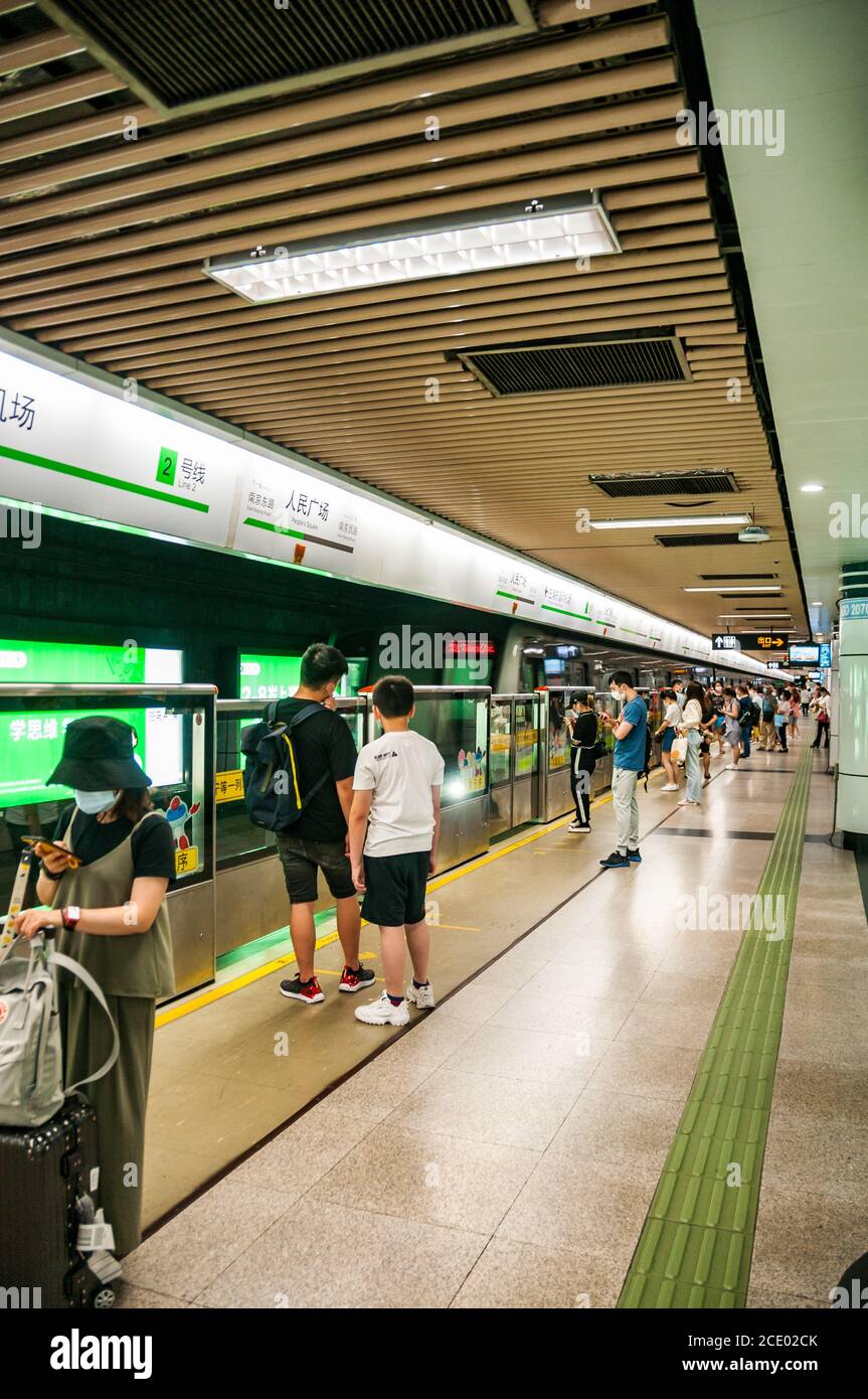 A Line 2 train bound for Guanlan Road station draws into Shanghai’s ...
