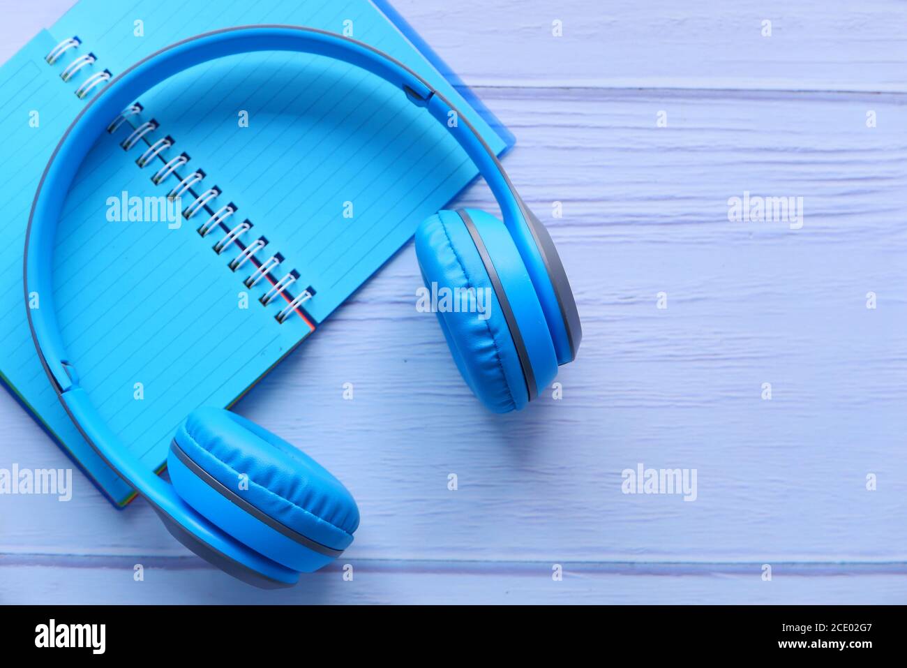 Audio book concept. Headphones and notepad on white background Stock ...
