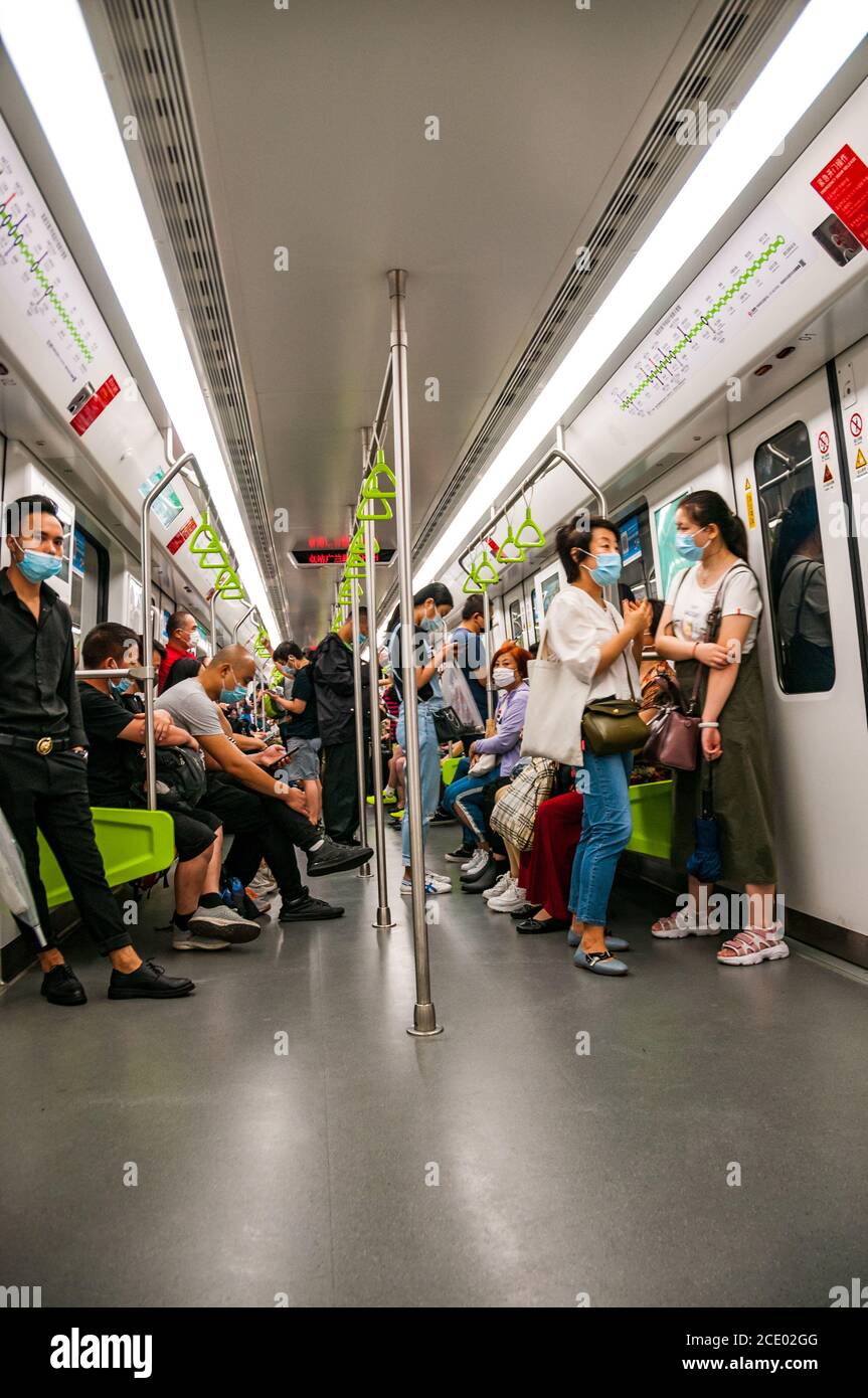 Commuters inside shanghai metro train hi-res stock photography and ...