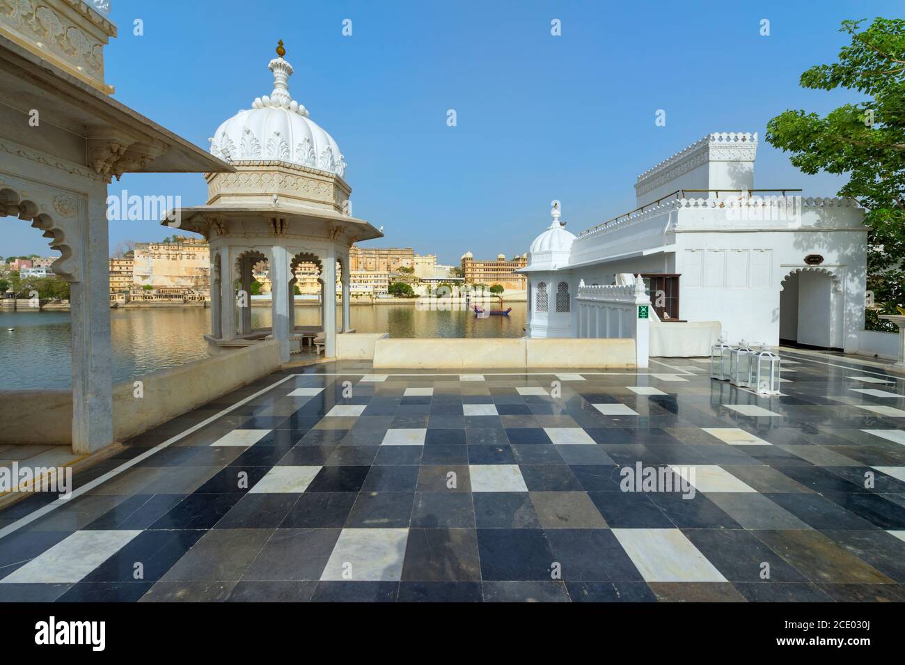 Lake Palace Hotel and view over City Palace, Udaipur, Rajasthan, India ...