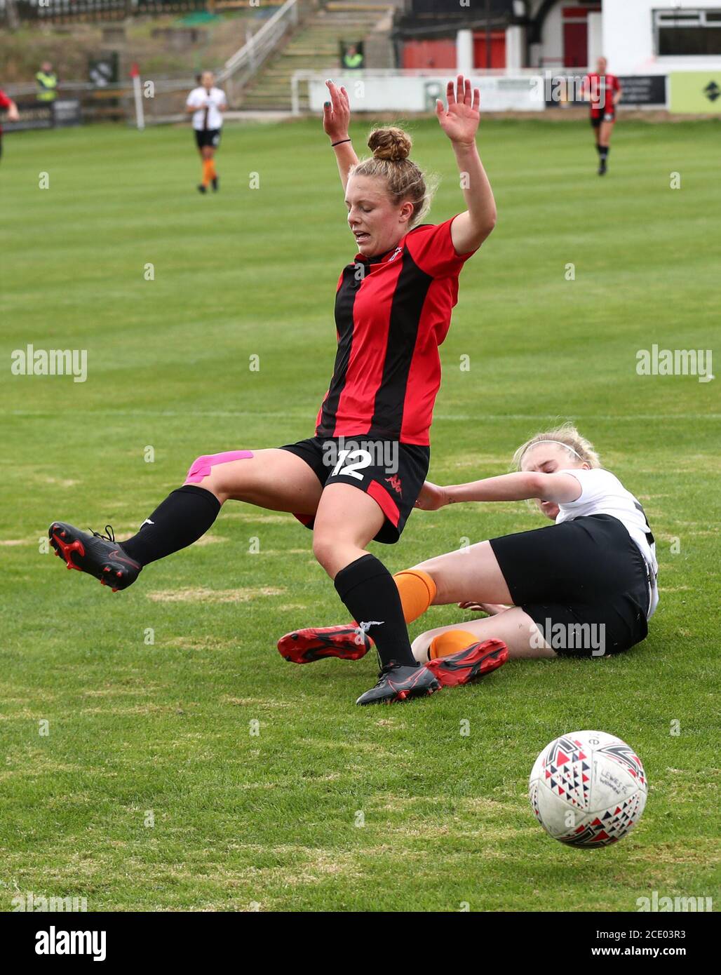 London Bees' Mollie Dench challenges Lewes' Ava Rowbotham during the ...