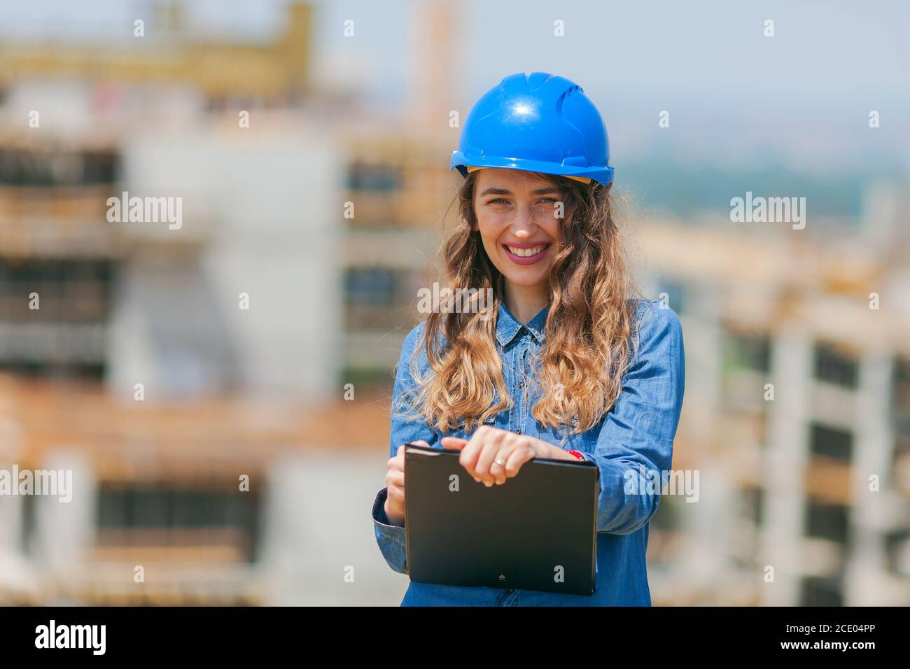 Construction site in blurred urban hi-res stock photography and images ...