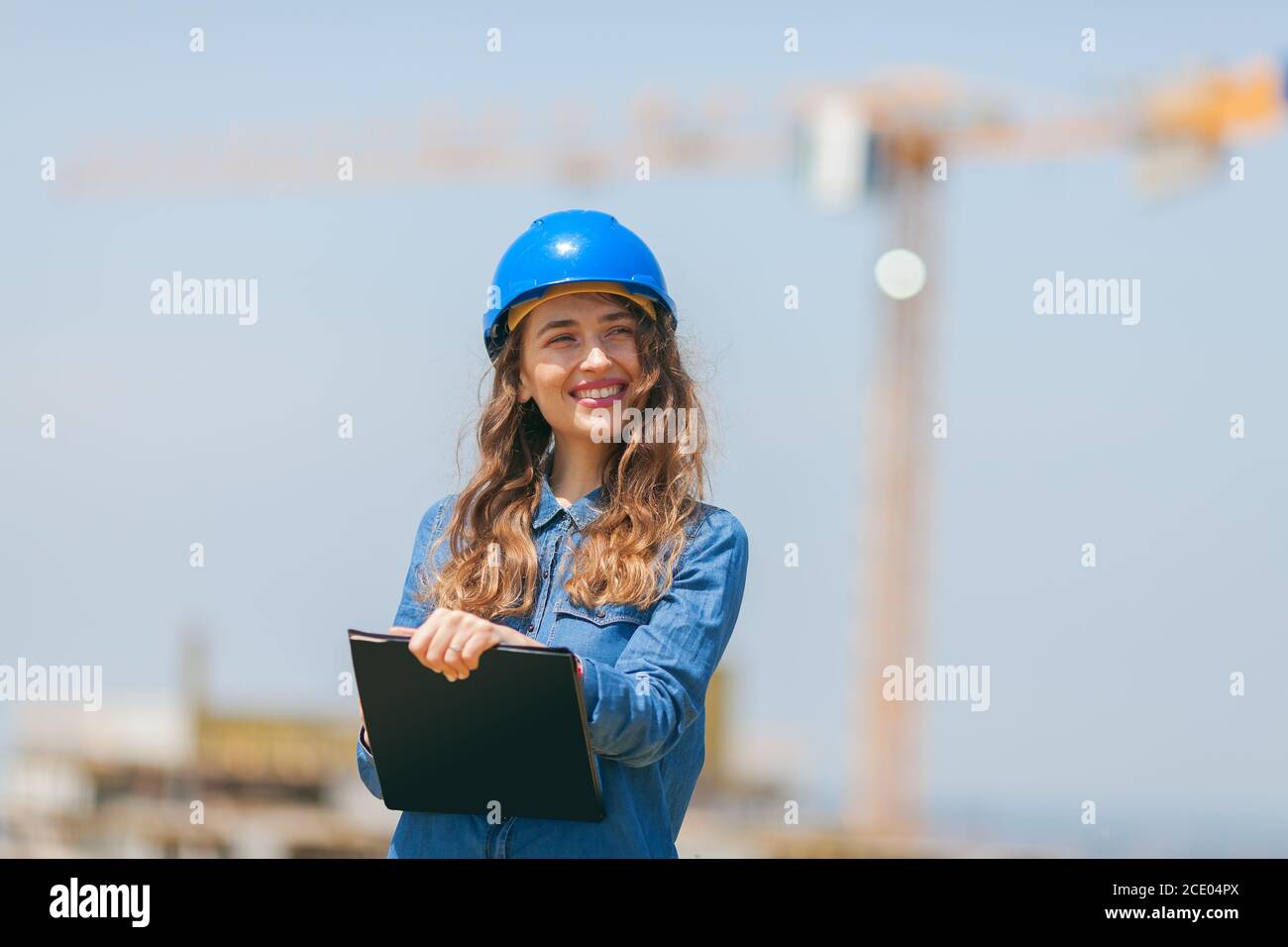 Construction site in blurred urban hi-res stock photography and images ...