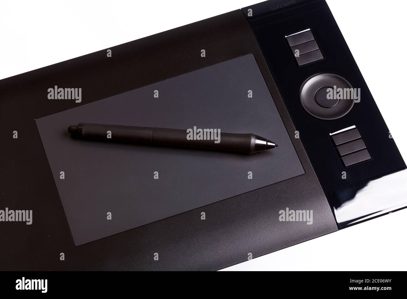Small size pen tablet with stilus isolated on white Stock Photo - Alamy