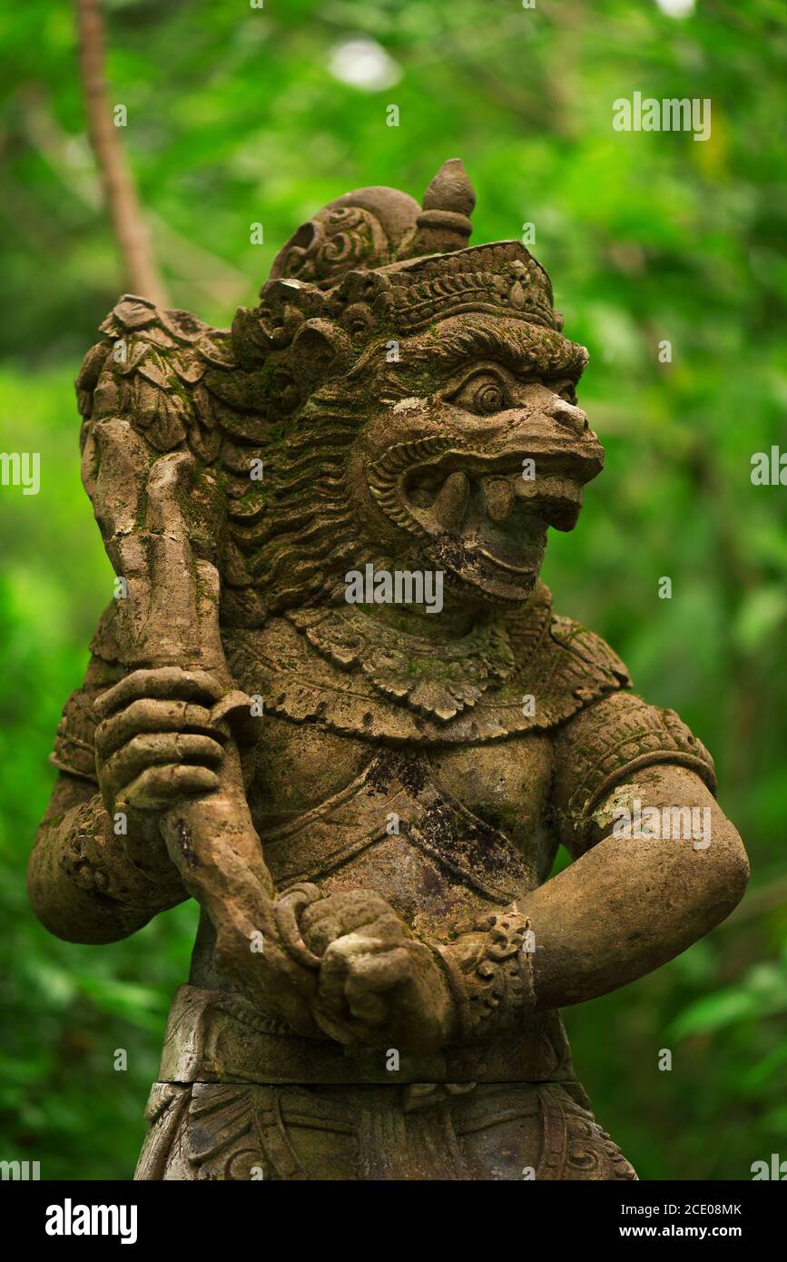 Statues and carvings depicting demons, gods and Balinese mythological ...