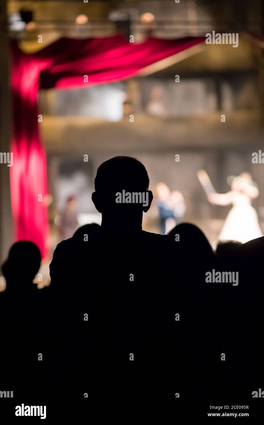 audience in the theater watching a play Stock Photo - Alamy