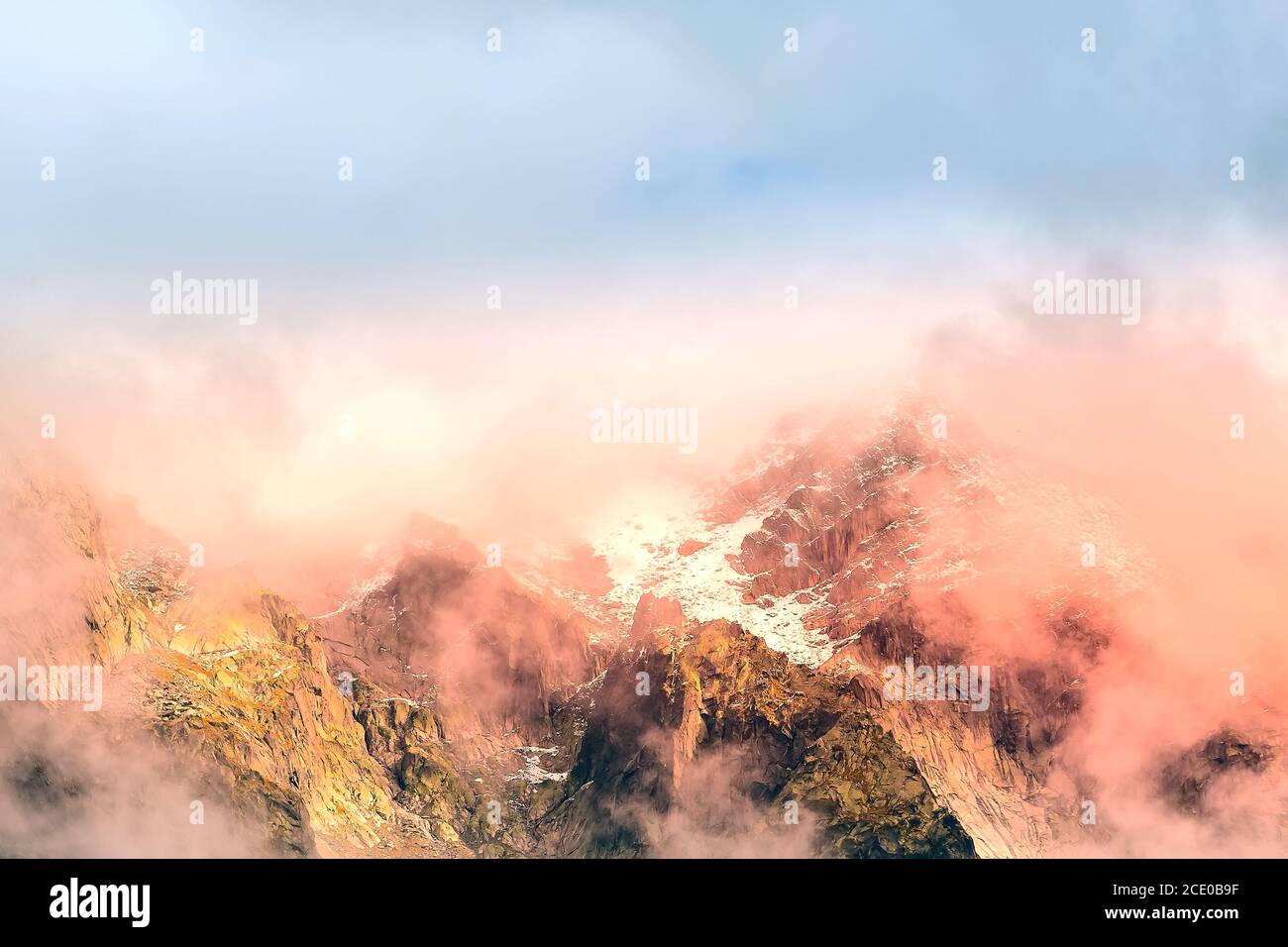 Colorful evening mountains landscape with clouds Stock Photo - Alamy