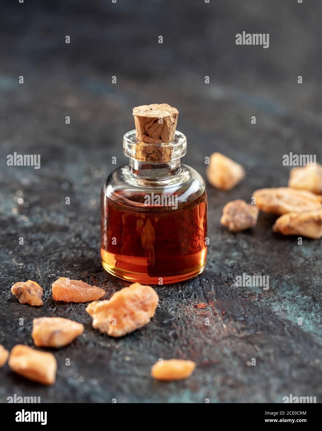 A bottle of styrax essential oil with benzoin resin Stock Photo - Alamy
