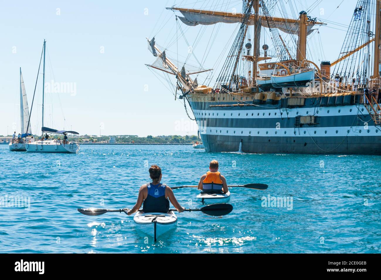 Kayakers welcoming the training ship of the Italian Navy "AMERIGO ...