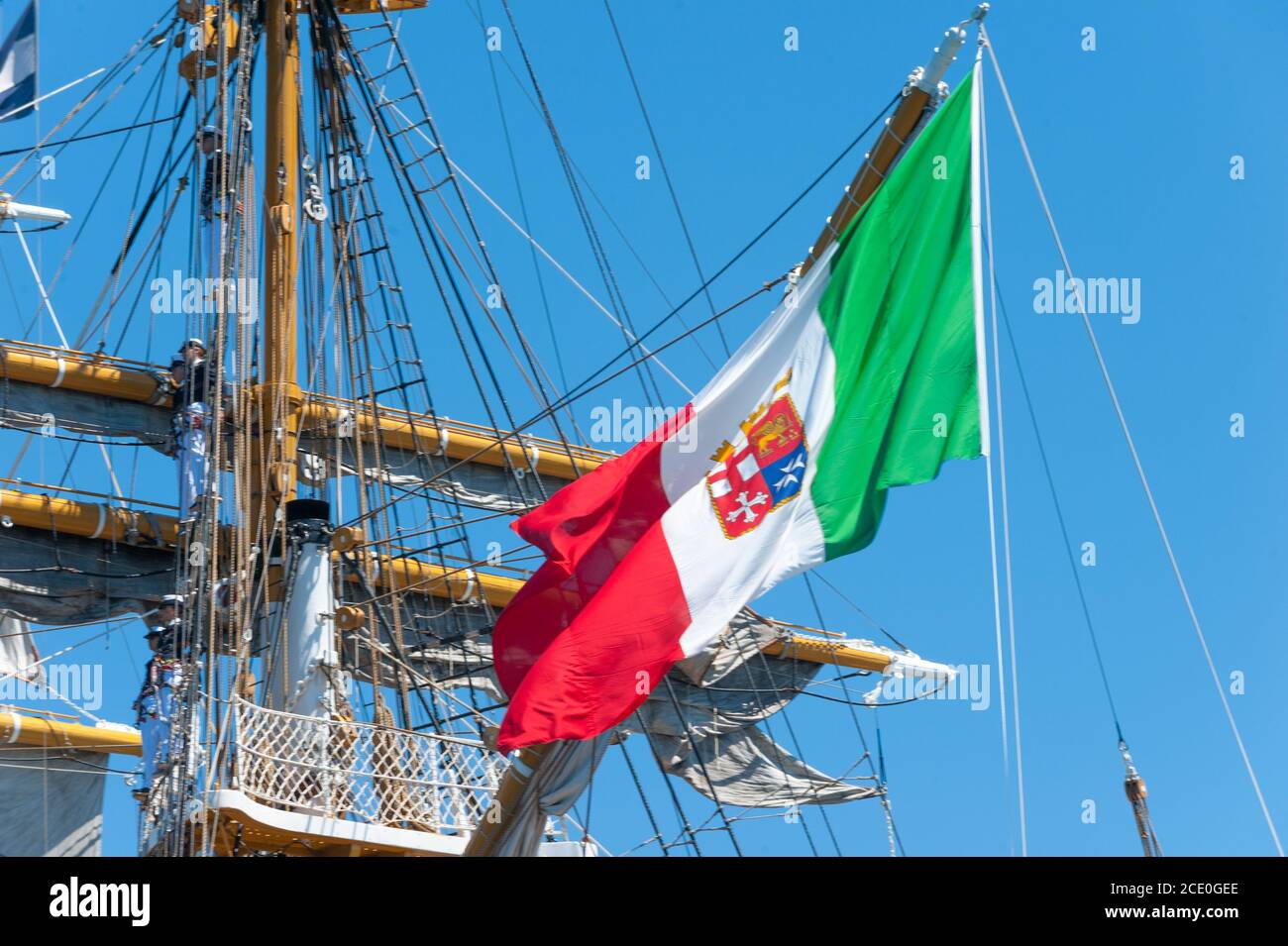 Italian Navy flag waving on the training ship of the Italian Navy ...