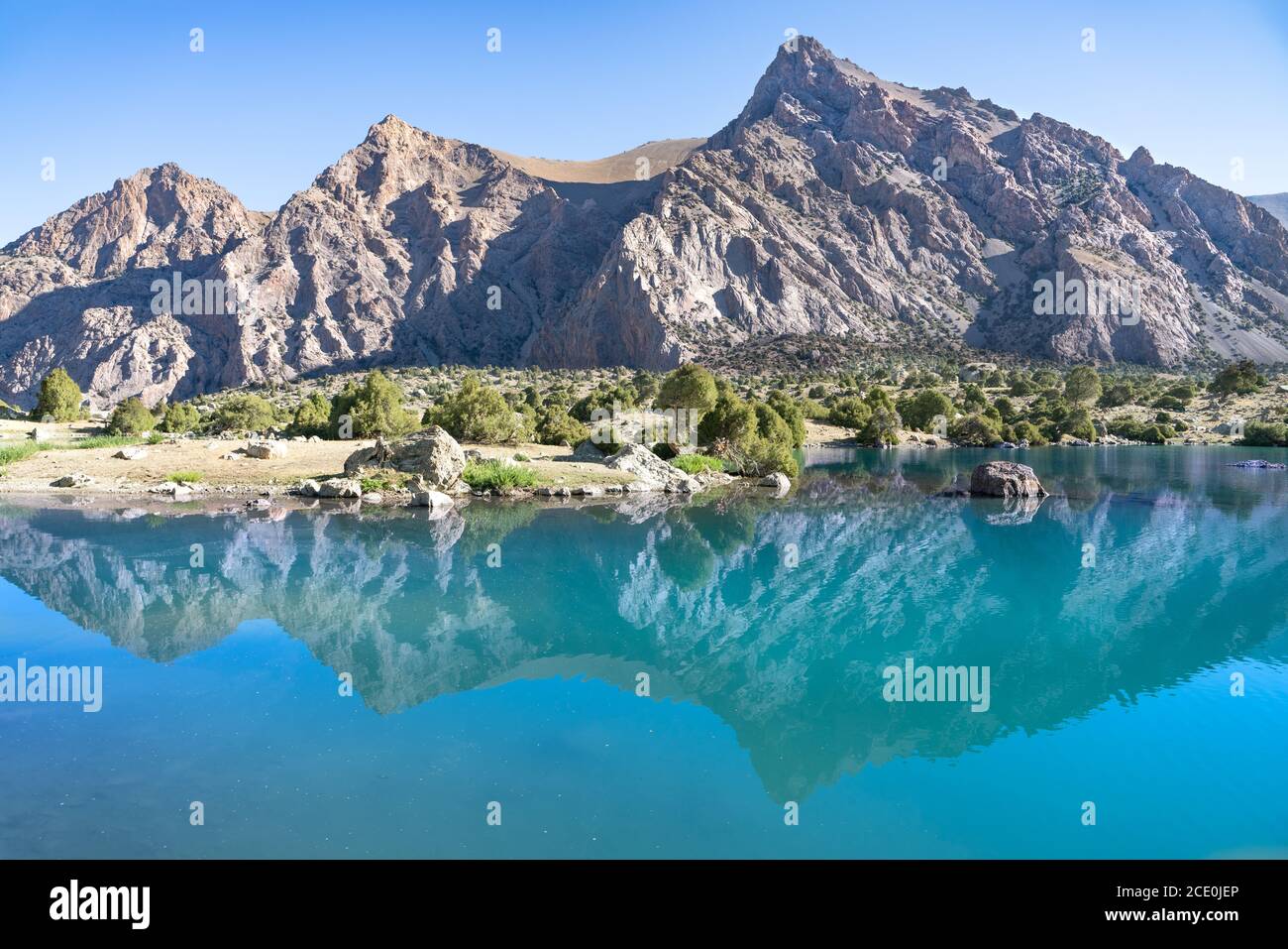 The Pamir range view and peaceful campsite on Kulikalon lake in Fann ...