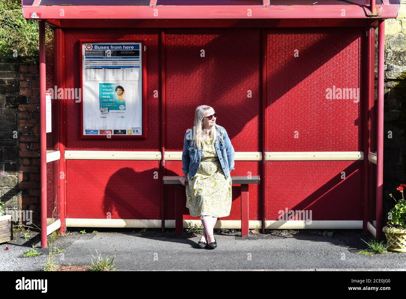 Bus stop waiting hi-res stock photography and images - Alamy