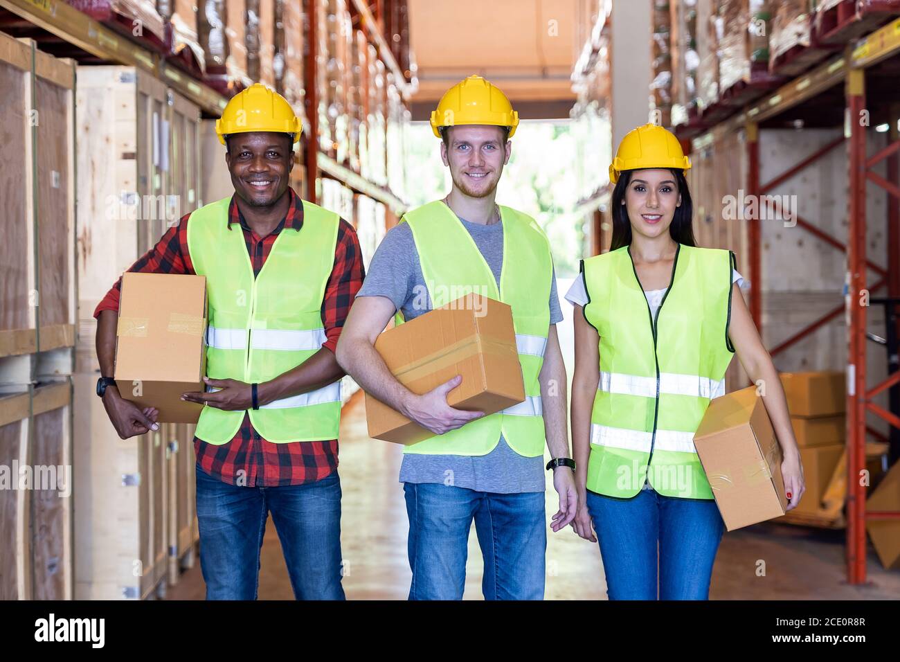 Diversity black and white warehouse worker portrait Stock Photo - Alamy