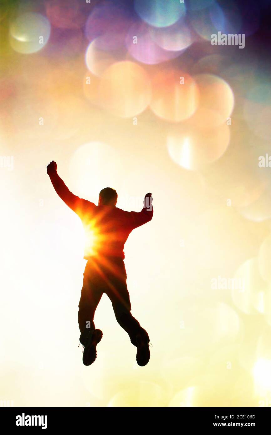 Film grain. Man fly in air. Man falling down with hands up. Sun and ...