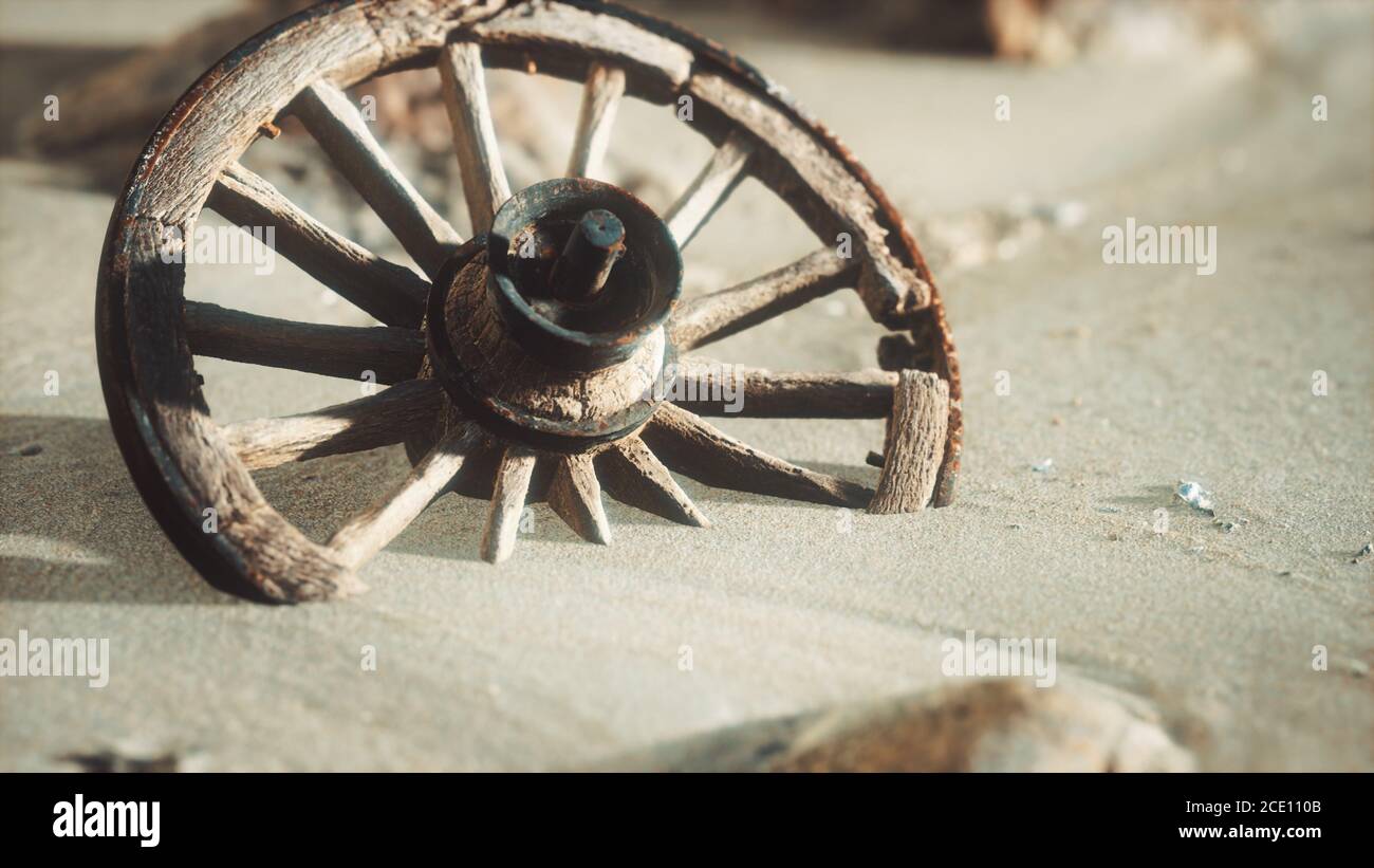Large wooden wheel in the sand Stock Photo - Alamy