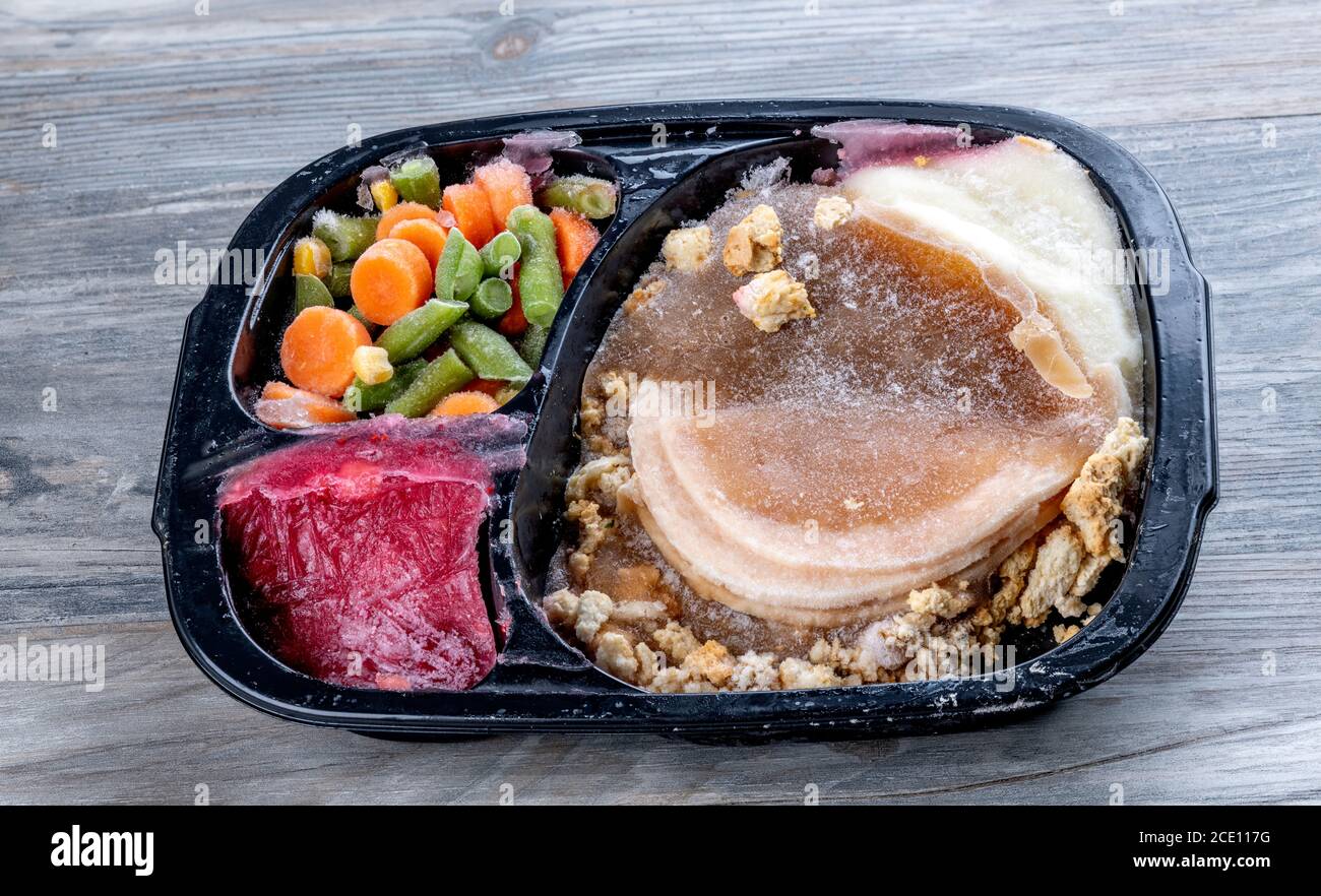 Frozen TV dinner in its tray with turkey and vegetables Stock Photo - Alamy