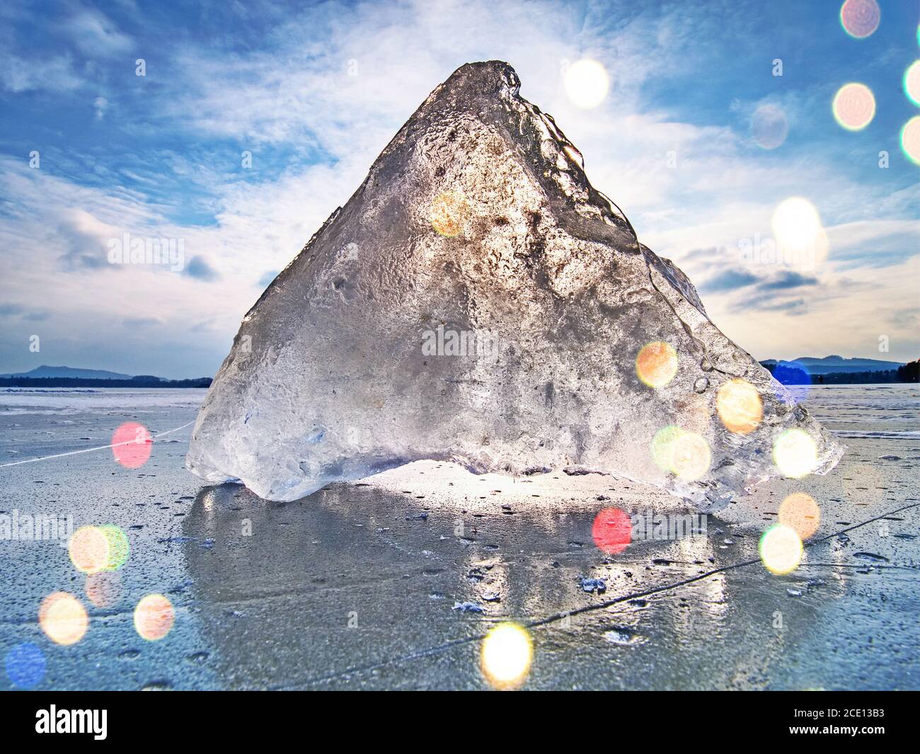 Abstract. Ice with deep scratches and cracks. Cut floe against to light ...