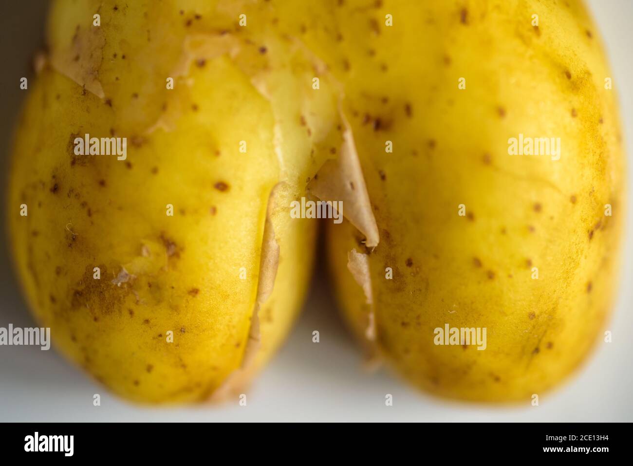 fun heart shape potato on bright background Stock Photo - Alamy