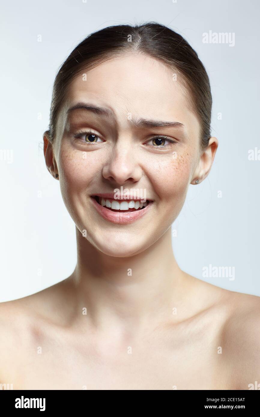 Headshot of emotional female face portrait with mocking facial ...