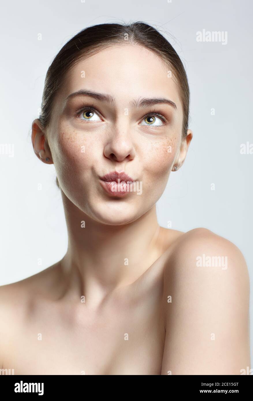 Headshot of emotional female face portrait with romantic flirty facial ...