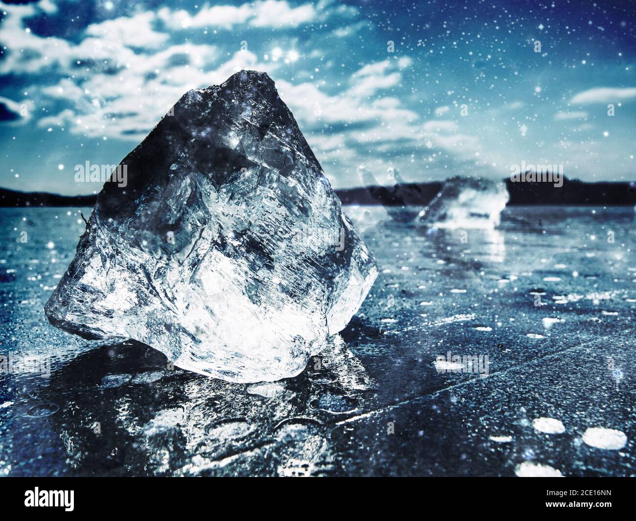 clear natural ice on frozen lake Stock Photo - Alamy