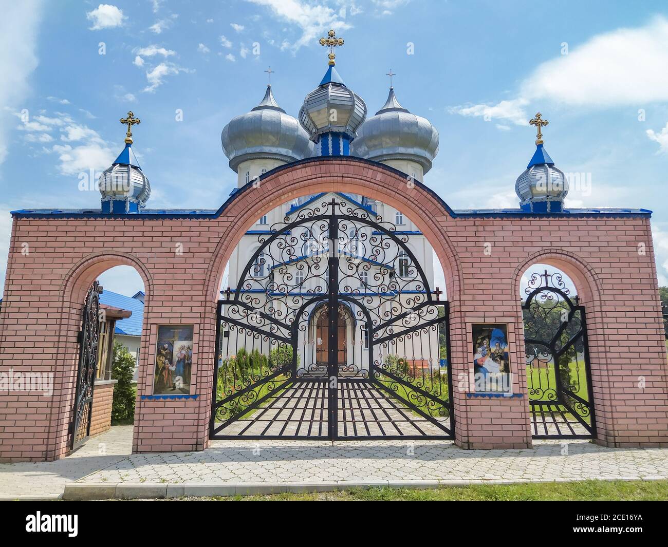 Gate to the courtyard of an orthodox church of traditional architecture ...