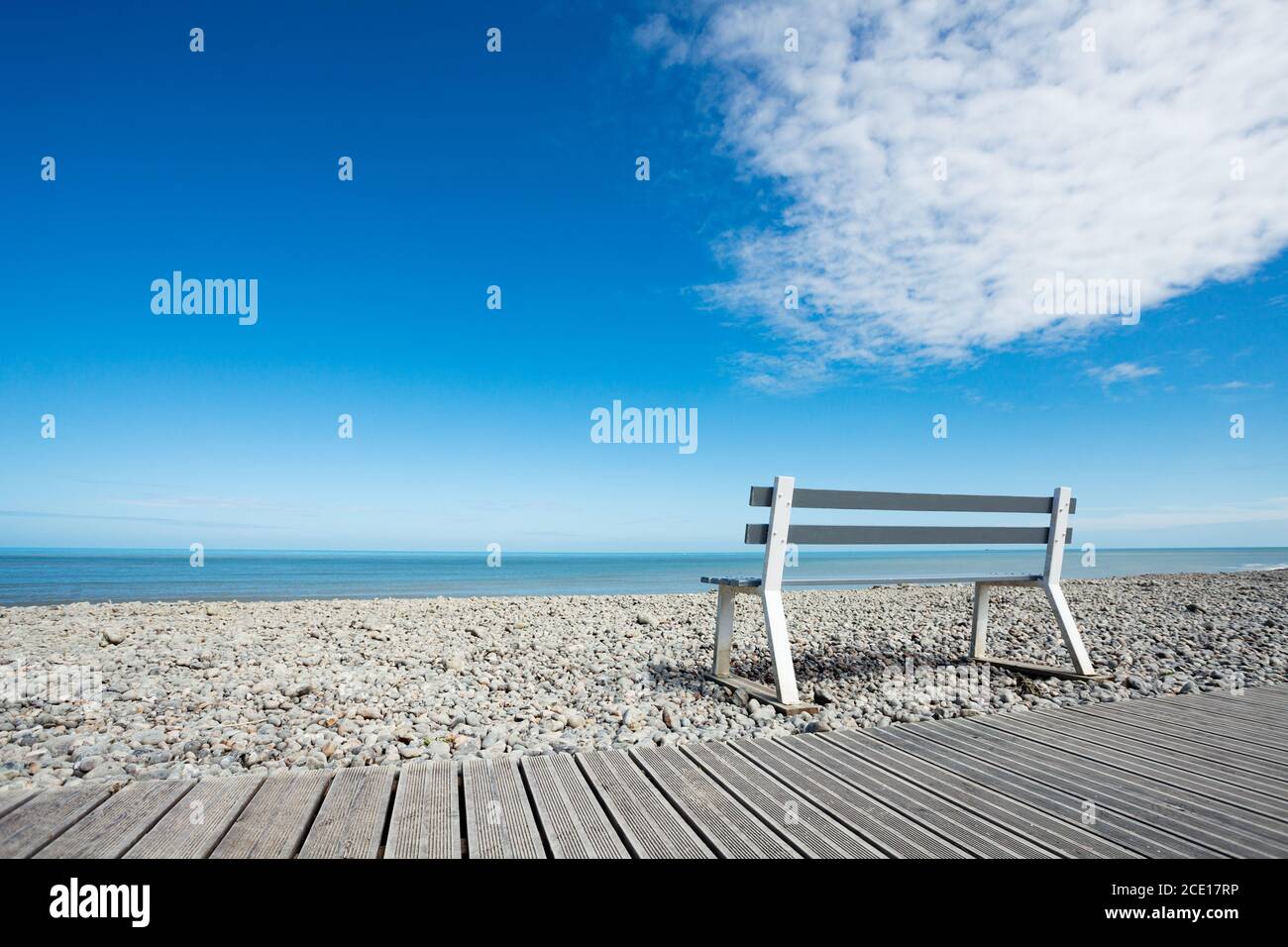 Beautiful wooden bench over clean beach and ocean background Stock ...