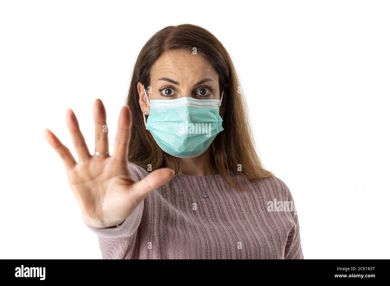 frightened woman with a mask on white Stock Photo - Alamy