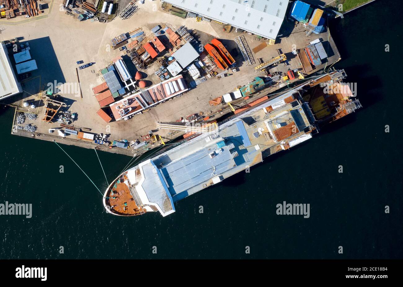 Shipbuilding construction ship aerial view at shipyard harbour with ...