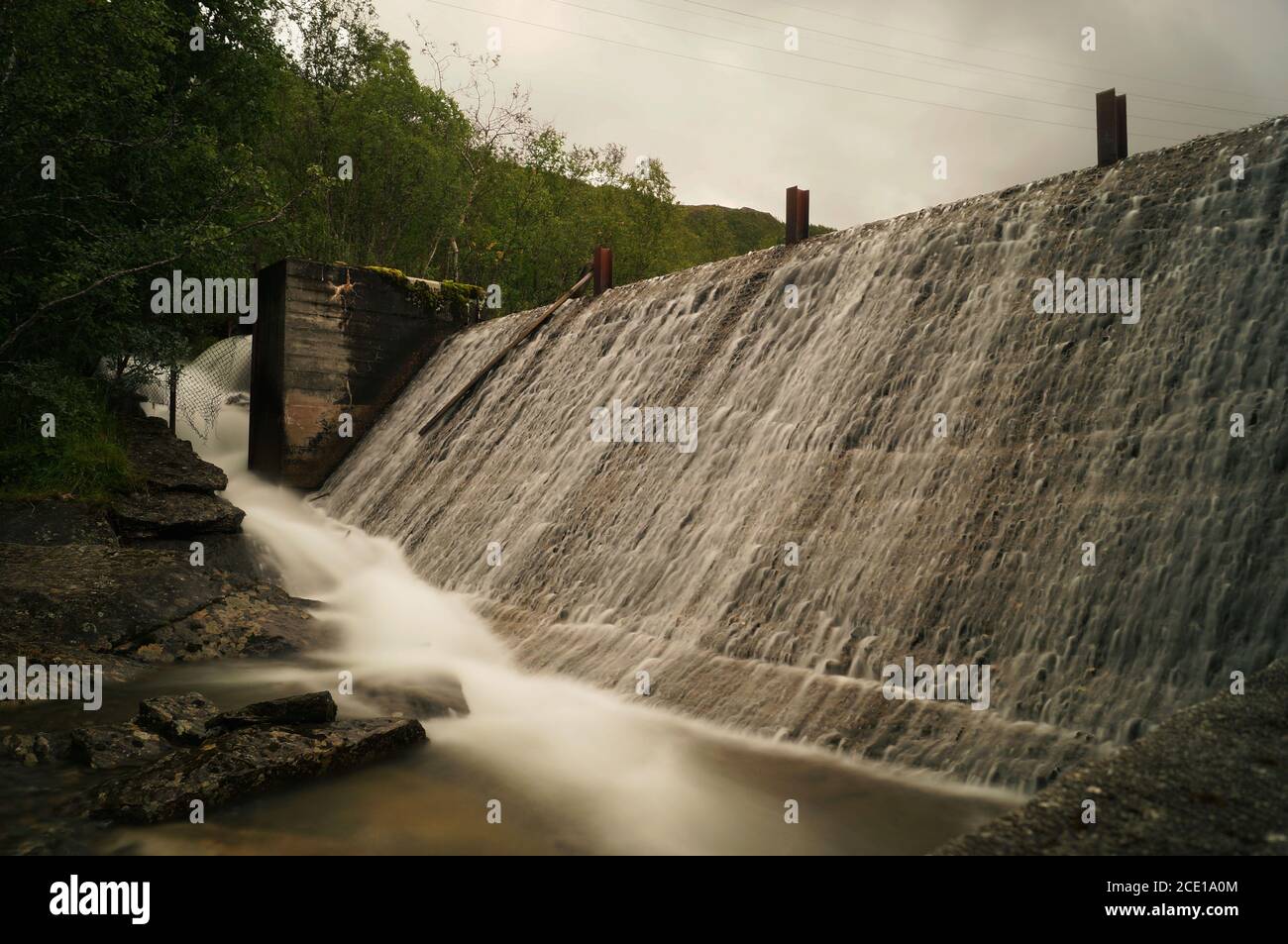 Dam with running water Stock Photo - Alamy