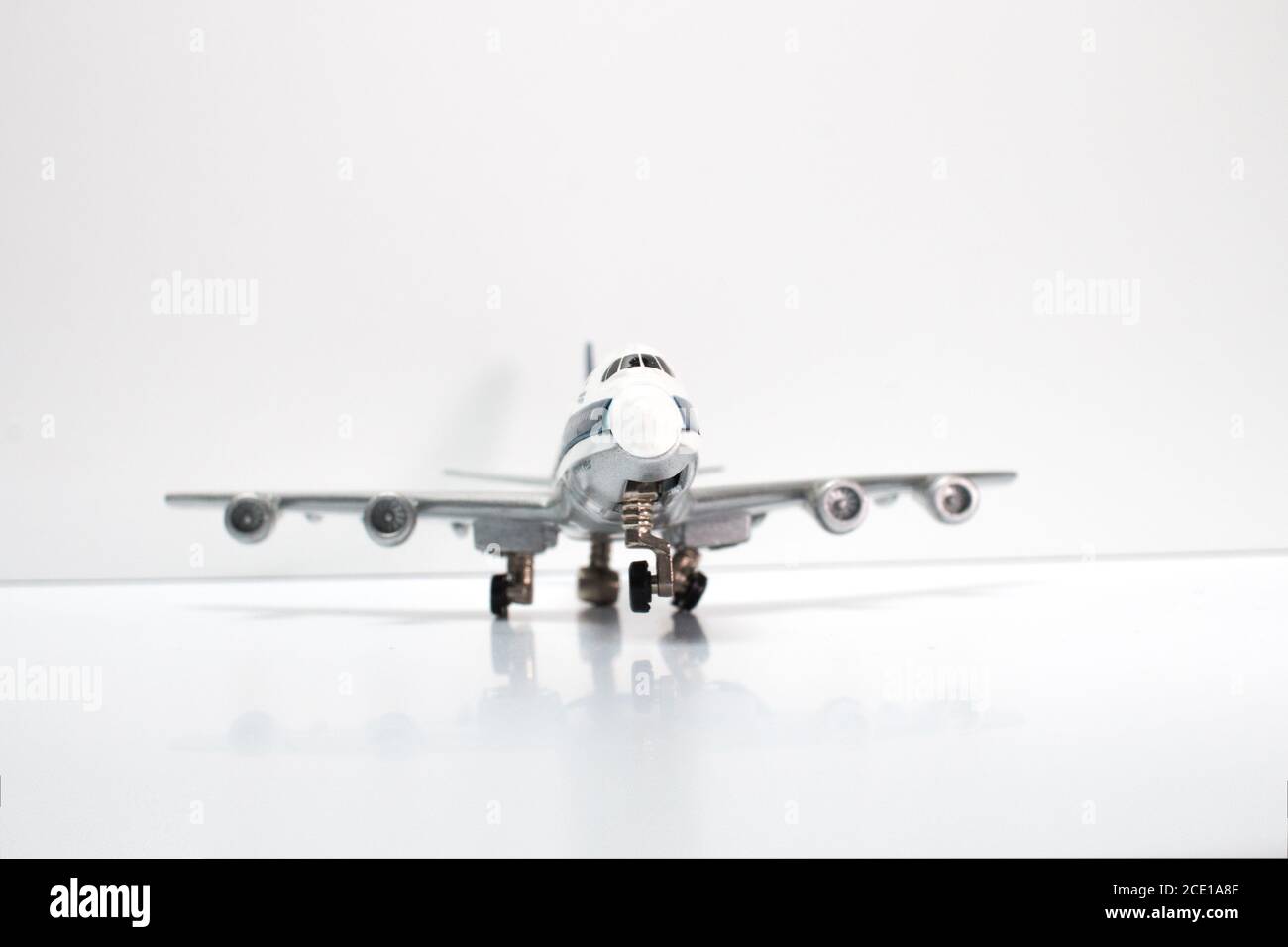 Model commercial aircraft taking off from a white background Stock ...