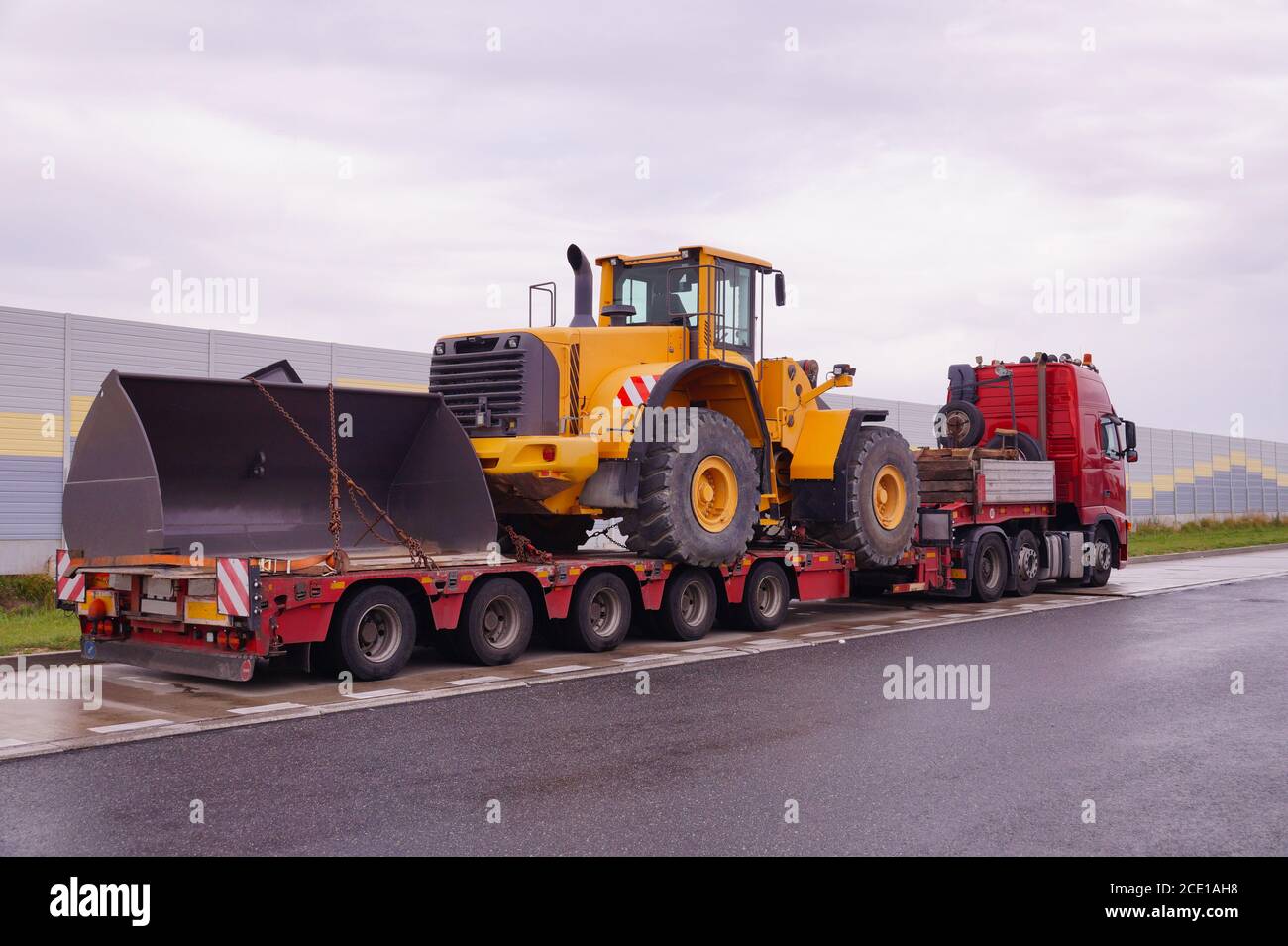 A truck with a special semi-trailer for transporting oversized loads ...
