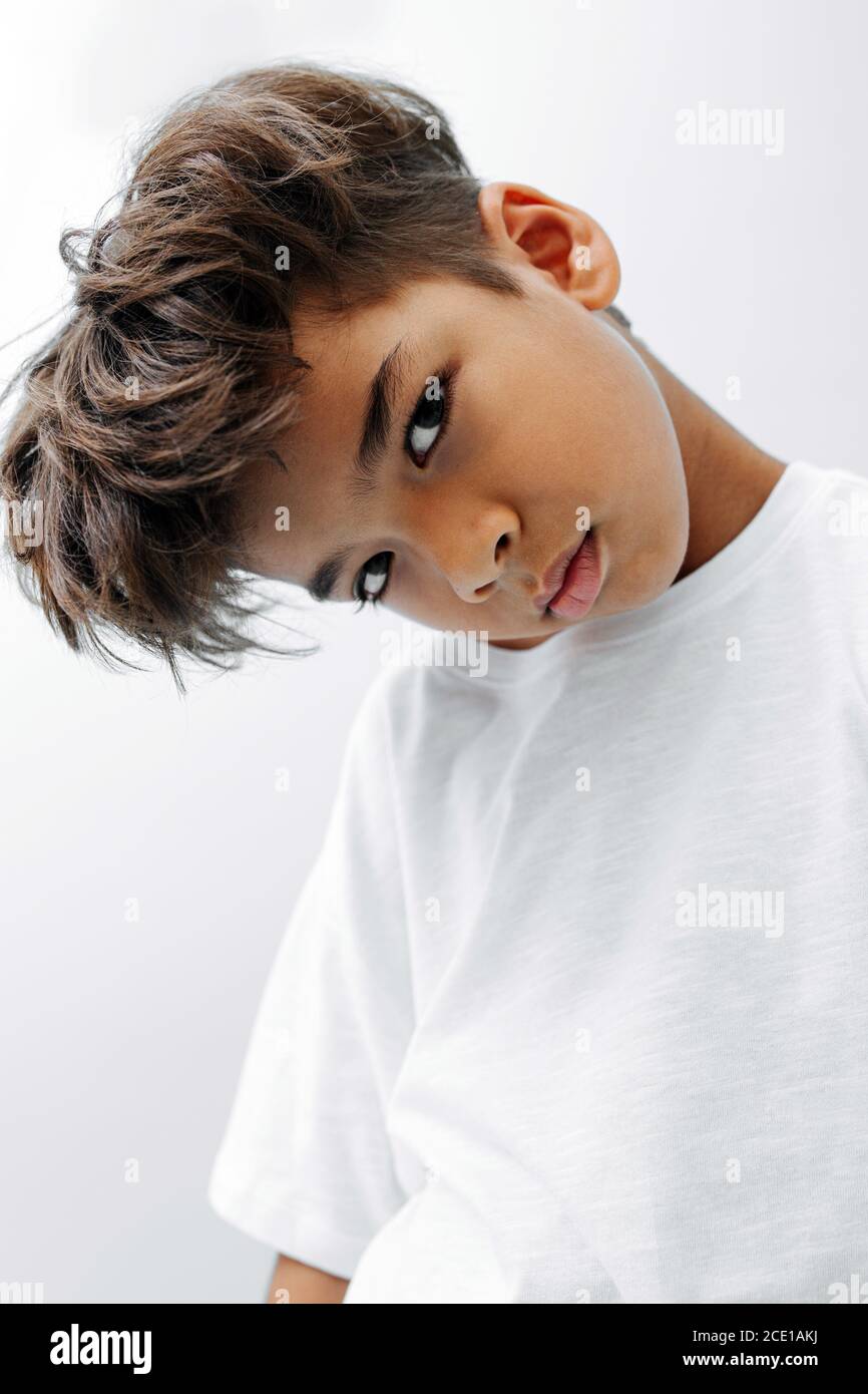 Child head tilted hi-res stock photography and images - Alamy