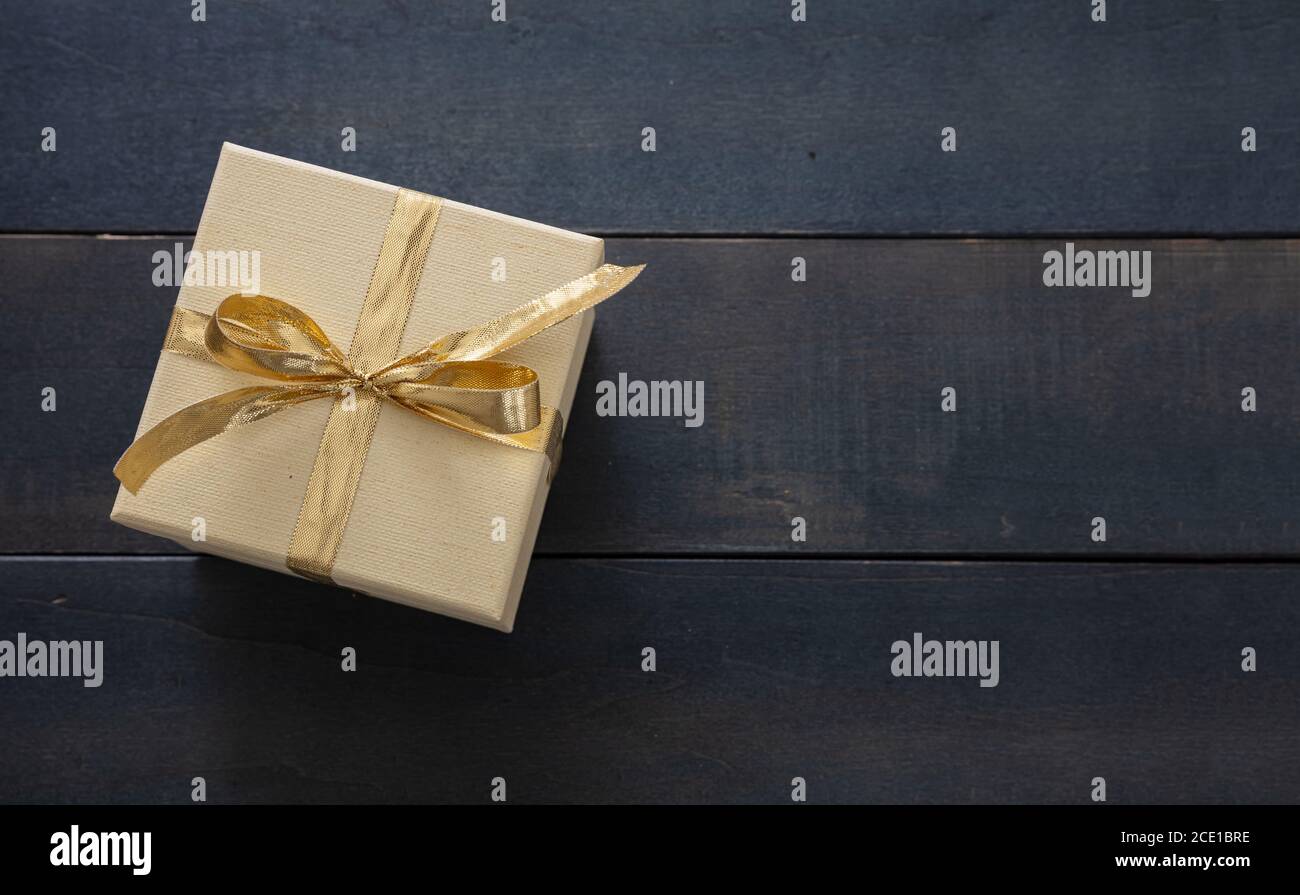 Surprise with present concept. Beige closed gift box packaging with ...