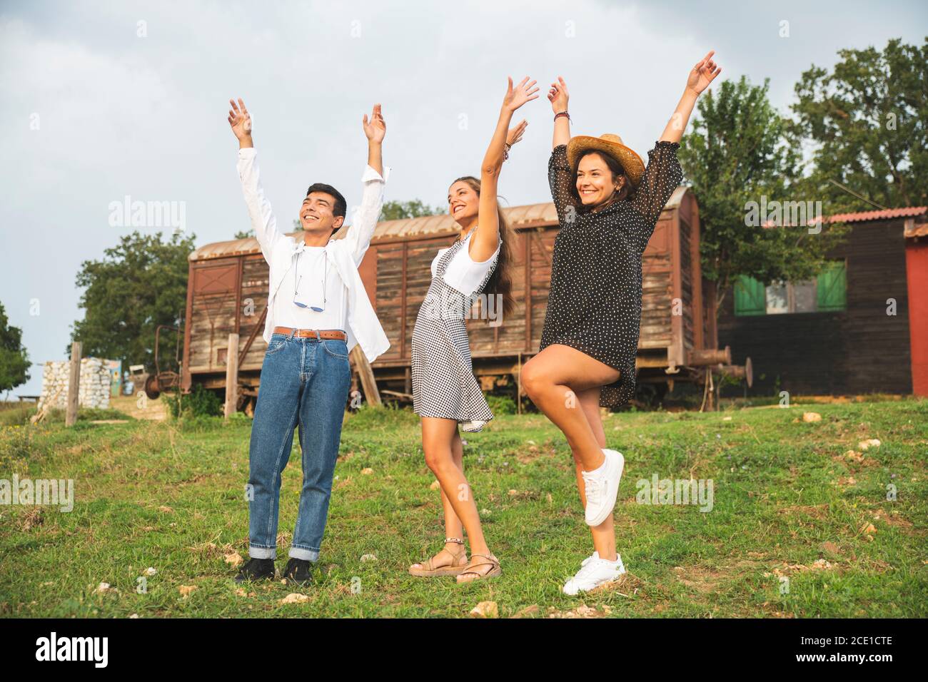 Three Happy and Joyful Friends having Fun in the Ranch. Ranch Concept ...