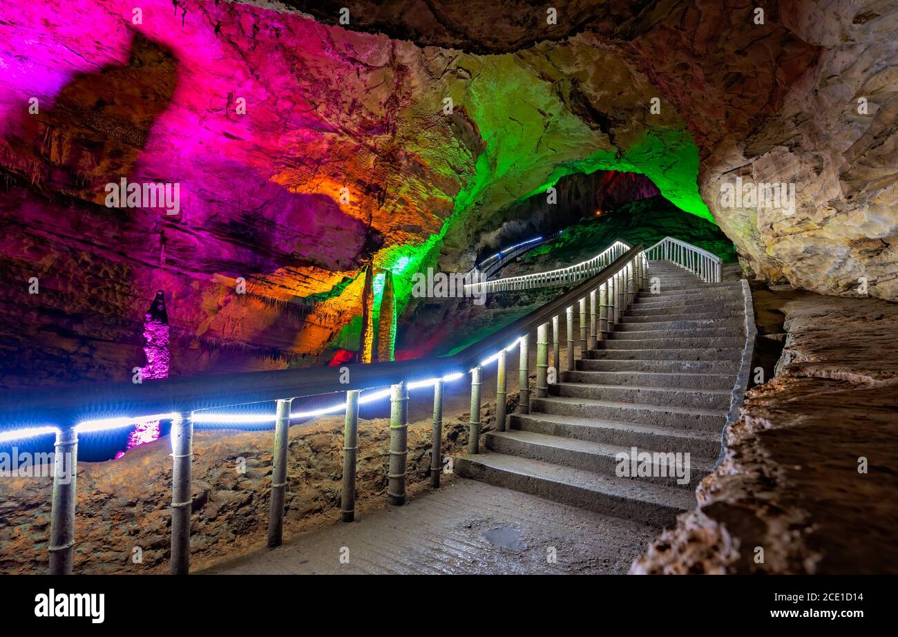 Illuminated stairs inside Huanglong Yellow Dragon Cave Stock Photo - Alamy