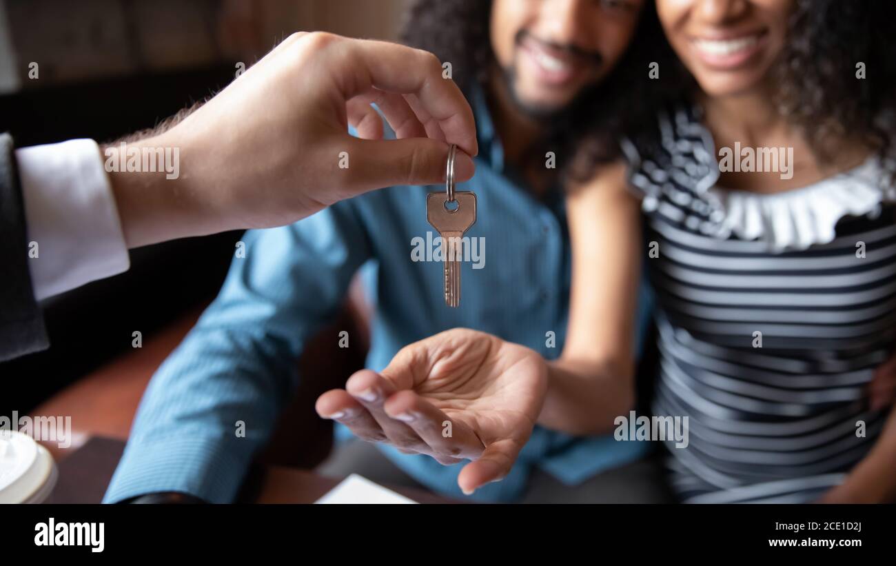 Couple receiving house keys hi-res stock photography and images - Alamy