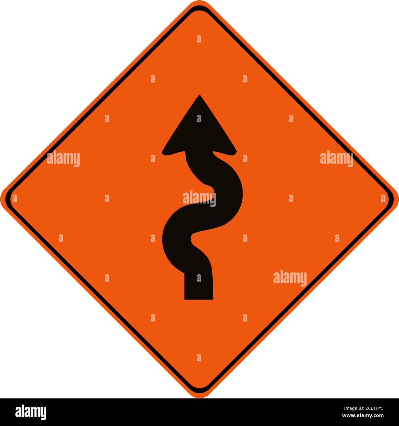 Warning sign with winding road symbol Stock Photo - Alamy
