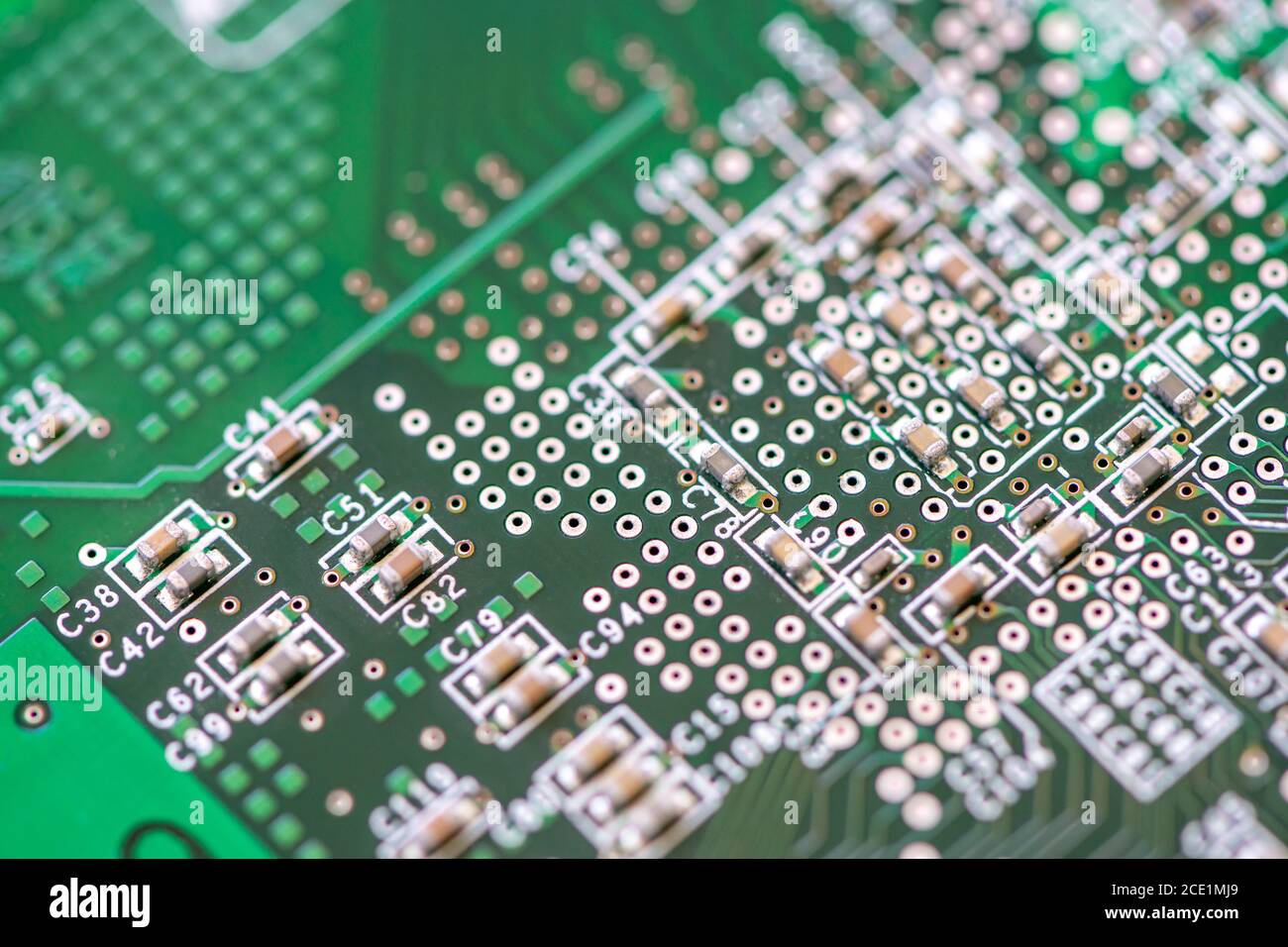 Close-up of a SMD capacitors on a printed circuit board. Electronic ...